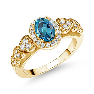 Gem Stone King 18K Yellow Gold Plated Silver Oval Topaz and White Moissanite Ring For Women (1.18 Cttw, Gemstone Birthstone, Available In Size 5, 6, 7, 8, 9)