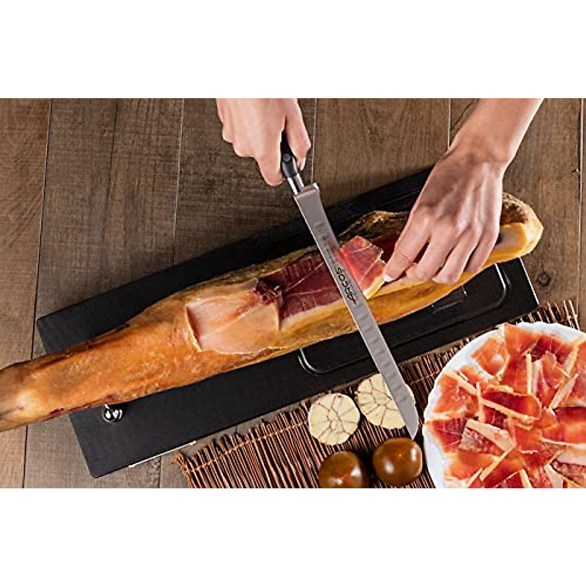 ARCOS Carving Knife 10 Inch Stainless Steel. Ham Slicer Knife for Cutting Ham and Meat. Ergonomic Polyoxymethylene Handle and 250mm Blade. Series Riviera. Color Black