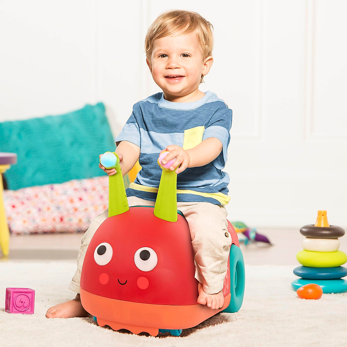 B. toys- Ladybuggy- Ride-On Toy with Lights & Sounds– Ladybug Ride On- Ergonomic Seat – 1 Year +