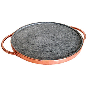 Cookstone 12" soapstone pizza stone with copper handles | Handcrafted from a slab of pure soapstone | Unique, durable and eco-friendly | Non-toxic and Non-stick