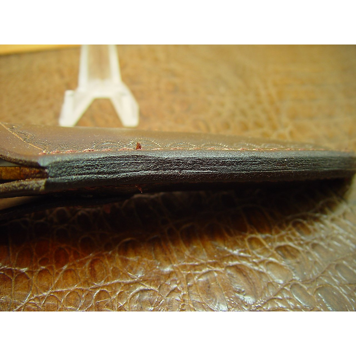 Custom Leather Vertical Knife Sheath. The Sheath Is Made Out of 10 Ounce Water Buffalo Hide Leather with a Border Tooling Dyed Dark Brown. The Sheath Is Made Out of Water Buffalo Leather the Water Buffalo Leather Is Very Soft Pliable and Durable. The Shea