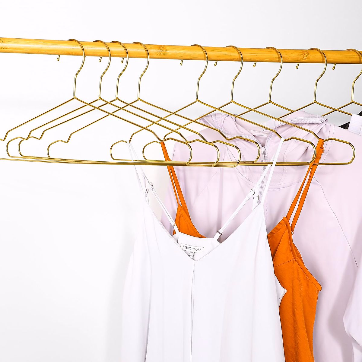 Wesiti 100 Pcs Stainless Steel Metal Hangers Wire Hangers for Clothes Strong Metal Hangers Wire 17.7 Inch Clothes Space for Coat Suit Bridal Boutique Dress Closet Dorm Clothing Rack(Gold)