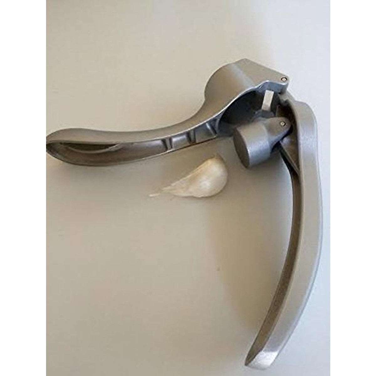 Pampered Chef Garlic Press 2575 - Easy Squeeze, Rust Proof, Ergonomic Handle - Professional Garlic Mincer & Ginger Press with Handy Cleaning Brush