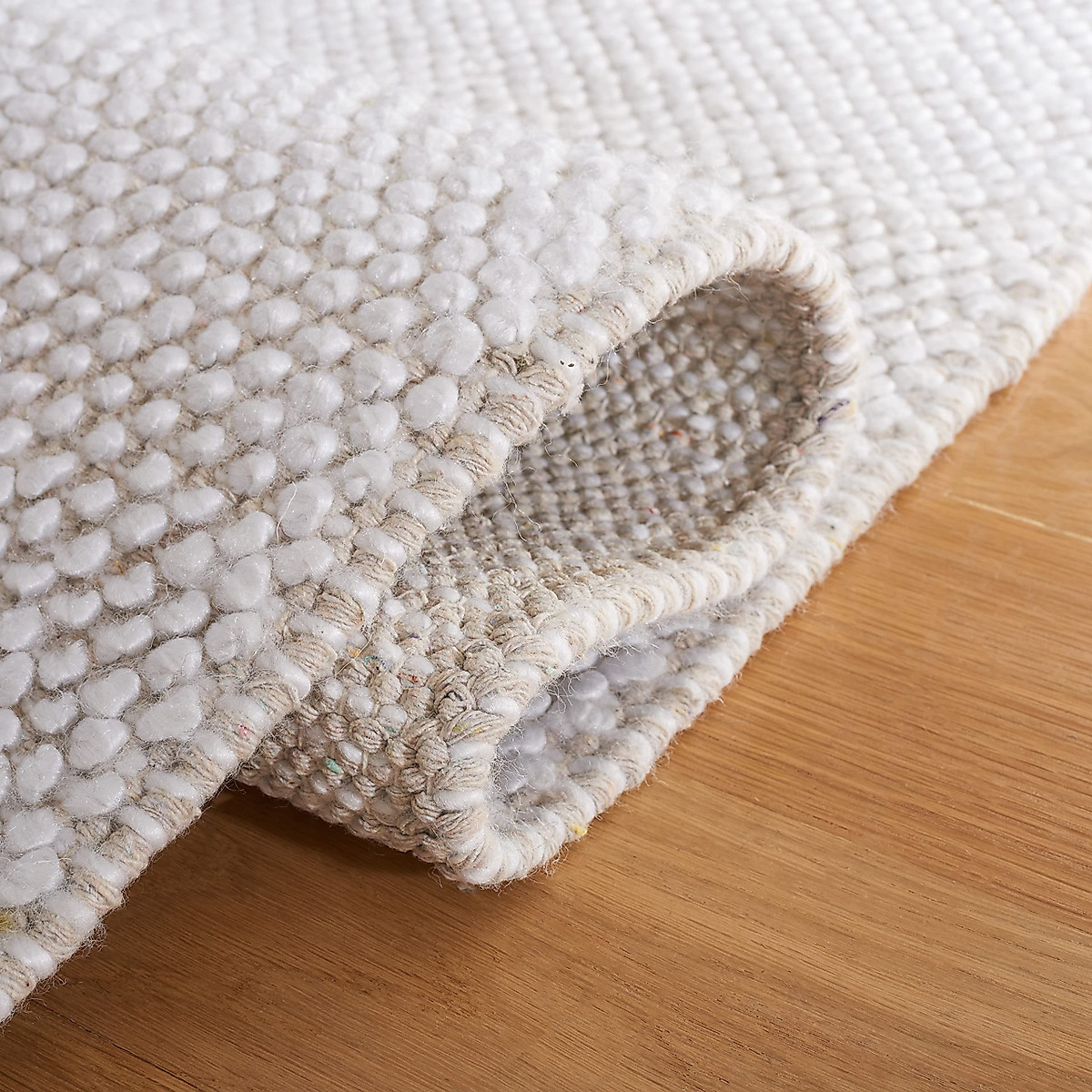 SAFAVIEH Natura Collection Accent Rug - 4' x 6', Ivory & Navy, Handmade Flat Weave Modern Stripe Wool, Ideal for High Traffic Areas in Entryway, Living Room, Bedroom (NAT324N)