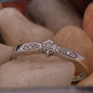 Dazzlingrock Collection 0.08 Carat (ctw) Sterling Silver Round Diamond Ladies Solitaire With Accent Engagement Ring, Size 7