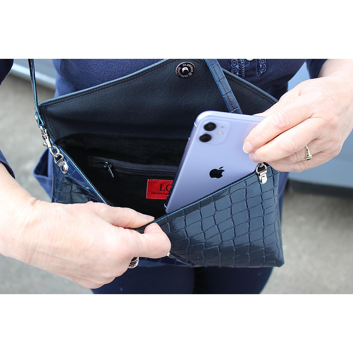 LONI Womens Neat envelope patent croc clutch bag in Black