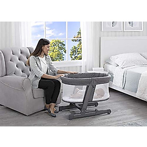 Simmons Kids Oval City Sleeper Bedside Bassinet - Adjustable Height Portable Crib with Wheels & Airflow Mesh, Grey Tweed 31.5x19.7x30 Inch (Pack of 1)