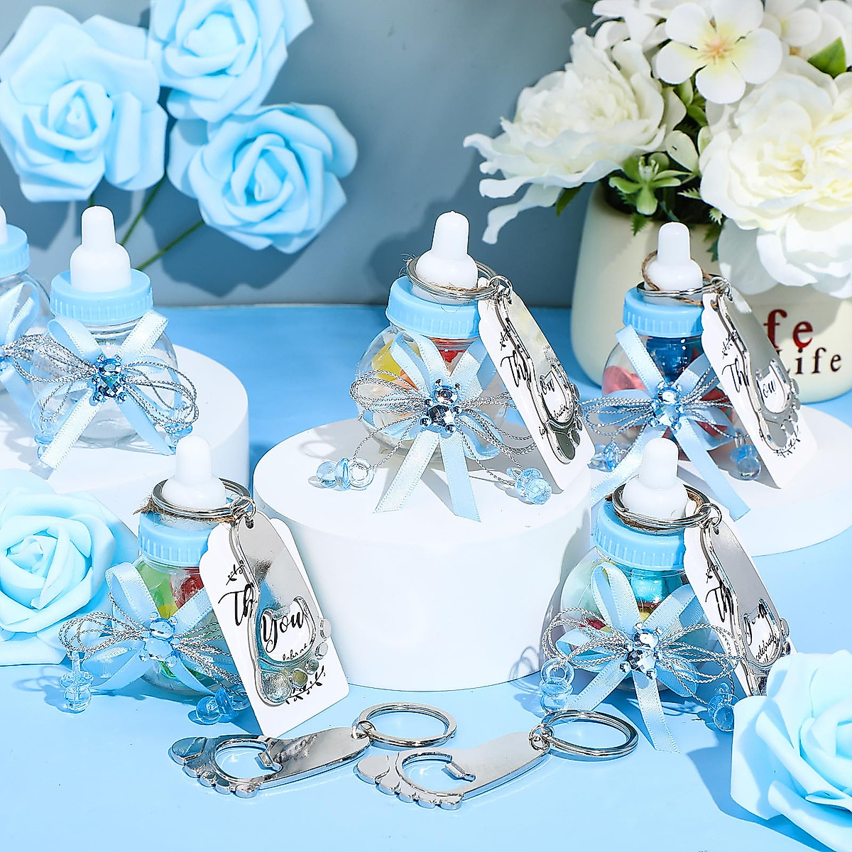 Suttmin 78 Pcs Baby Bottle Party Favors for Baby Shower 24 Mini Candy Bottles 24 Baby Footprint Bottle Openers 24 Thank Tags 6 Rose Flower for Boy Girl Baby Shower Party Decor(Blue, Silver)