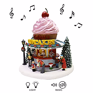 MOMENTS IN TIME Christmas Village Building, Cupcake Shop with LED Lights and Christmas Music - Battery Operated (not Included) (10.4" H x 9.5" W x 7.5" D)