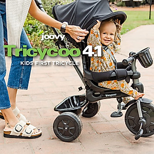 Joovy 4.1 Kids Tricycle with 4-Stages Featuring Extra-Wide Front Tire, Removable and Adjustable Parent Handle, Safety Harness, Machine-Washable Seat Pad, and Retractable Canopy (Black)