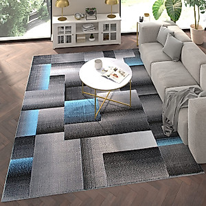 EMMA + OLIVER Malaga Olefin Accent Rug - Modern Cubist Pattern - Black and Gray Shades with Vibrant Blue Accents - 8x10 - Moisture & Stain Resistant
