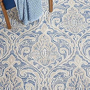 SAFAVIEH Micro-Loop Collection Area Rug - 8' x 10', Blue & Ivory, Handmade Wool, Ideal for High Traffic Areas in Living Room, Bedroom (MLP532M)