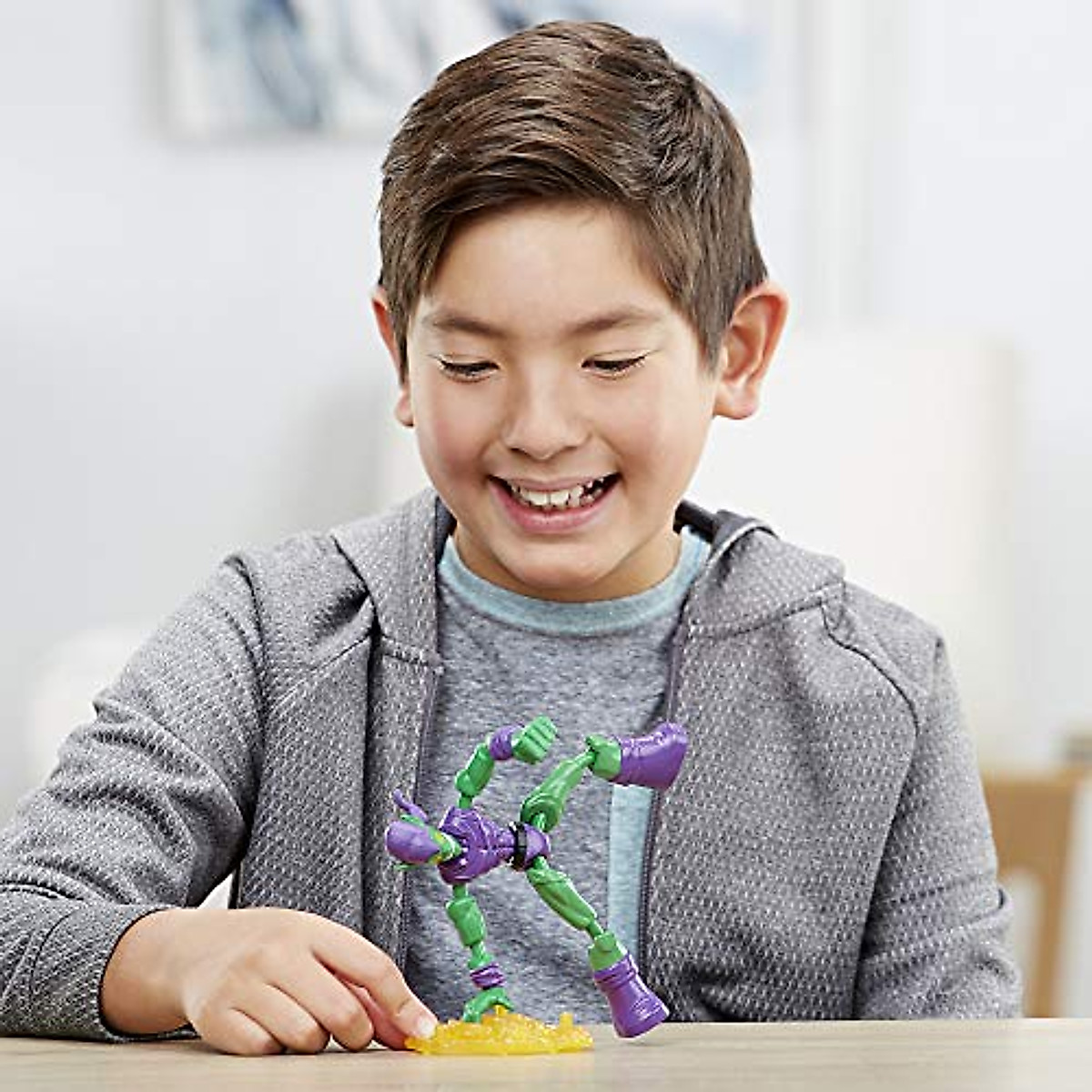 Spider-Man Marvel Bend and Flex Green Goblin Action Figure Toy, 6-Inch Flexible Figure, Includes Blast Accessories, for Kids Ages 4 and Up