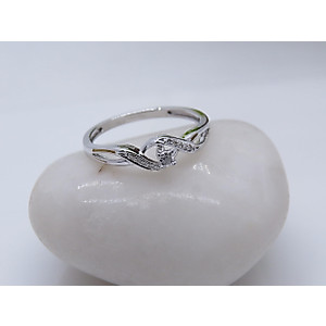 Dazzlingrock Collection Round White Diamond Crossover Swirl Promise Engagement Ring for Women (0.06 ctw, Color I-J, Clarity I2-I3) in 925 Sterling Silver Size 7