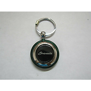 1975 1976 1977 1978 1979 1980 1981 1982 GRANADA SCRIPT LOGO ROUND PLASTIC KEYCHAIN - GREEN