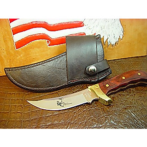 Custom-made Cross Draw Knife Sheath for the Buck Kalinga 401 Knife. The Sheath Is Made Out of 10 Ounce Water Buffalo Hide Leather. The 10 oz. Leather is Dyed Dark Brown. The Sheath Also Has a Strap for Extra Security of Your Knife From Falling Out. The Sh