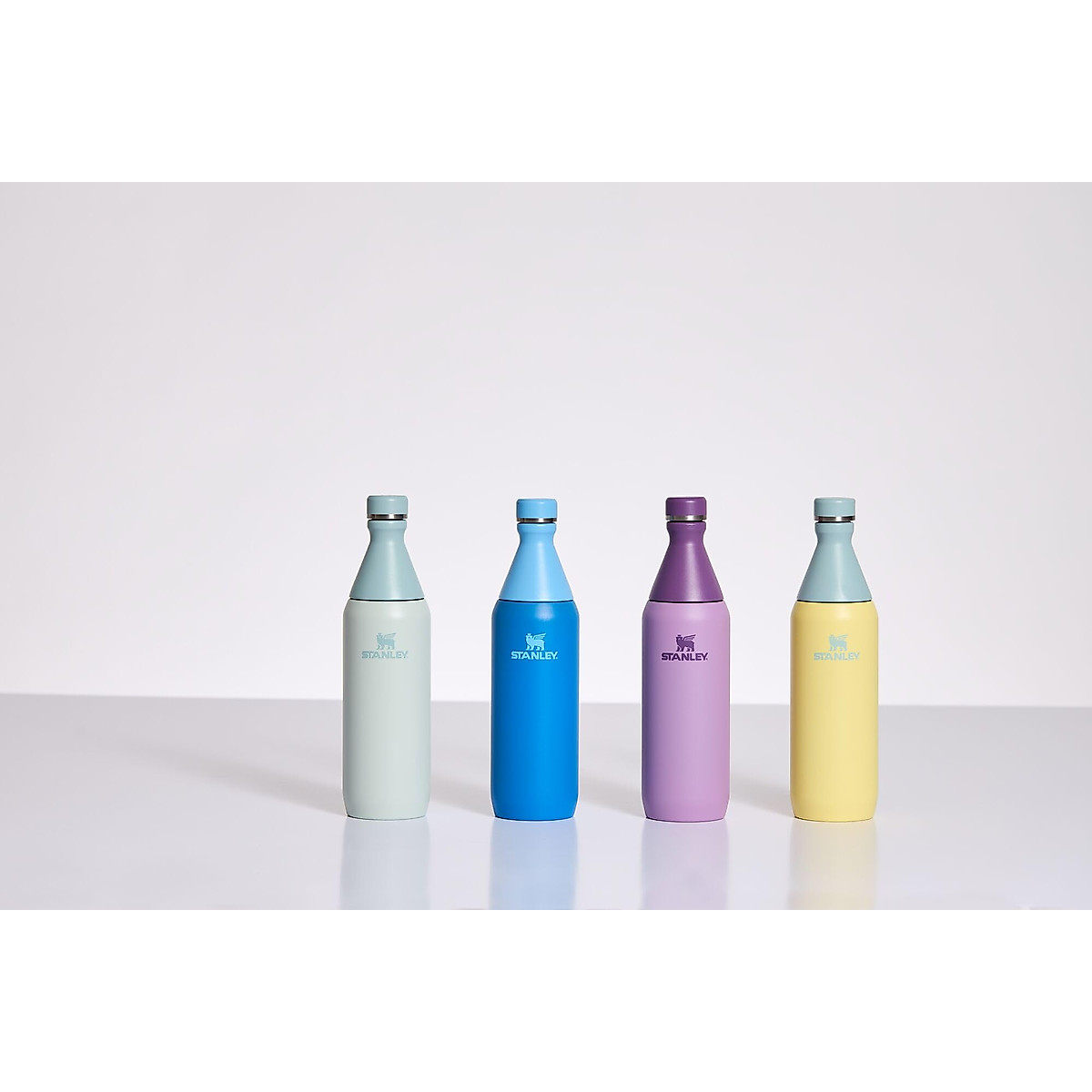 Stanley All Day Slim Bottle 20 oz | Leakproof Twist on Lid | Slim Design for Travel and Gym | Insulated Stainless Steel Water Bottle | BPA-Free | Azure