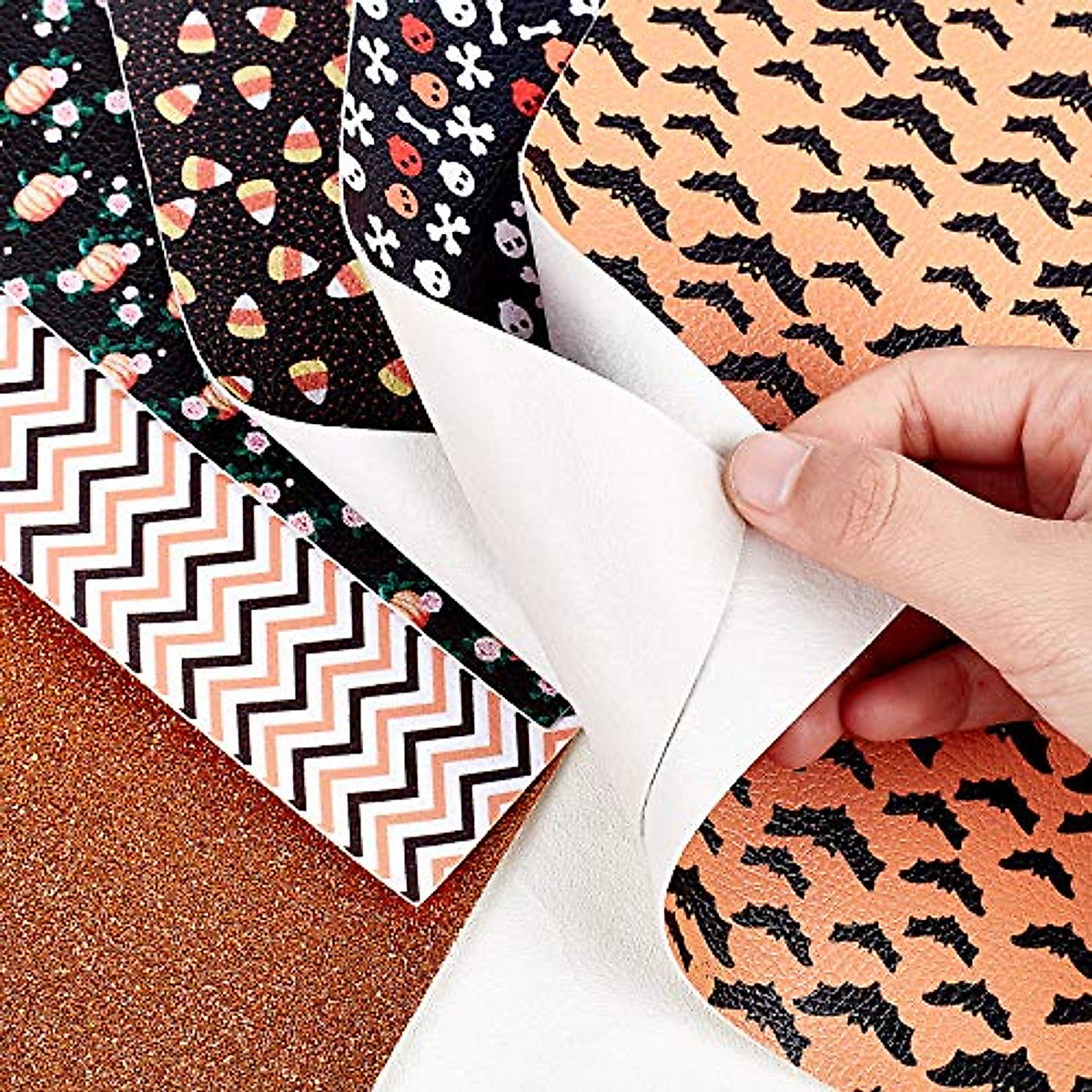 FINGERINSPIRE 10Pcs Halloween Theme Printed Faux Leather Sheets Assorted Synthetic Leather Fabric(8.3x6.3inch) for Making Hair Bow Earrings Making Crafting Party Decor DIY Projects