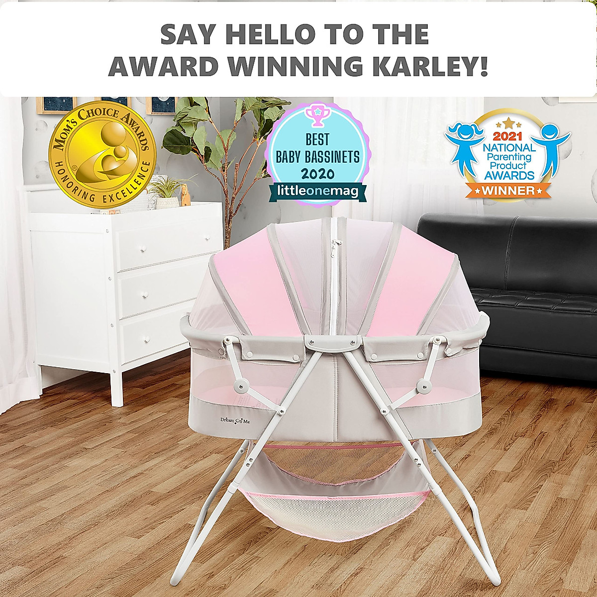 Karley Baby Bassinet in Grey and Pink, Lightweight Portable, Quick Fold and Easy to Carry , Adjustable Double Canopy, Indoor and Outdoor with Large Storage Basket.