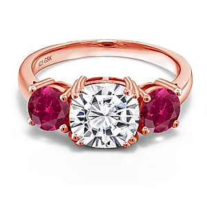 18K Rose Gold Plated Silver Forever Classic Moissanite From Charles & Colvard and Red Created Ruby 3 Stone Engagement Ring For Women (3.70 Cttw, Gemstone, Cushion 8MM, Size 5)
