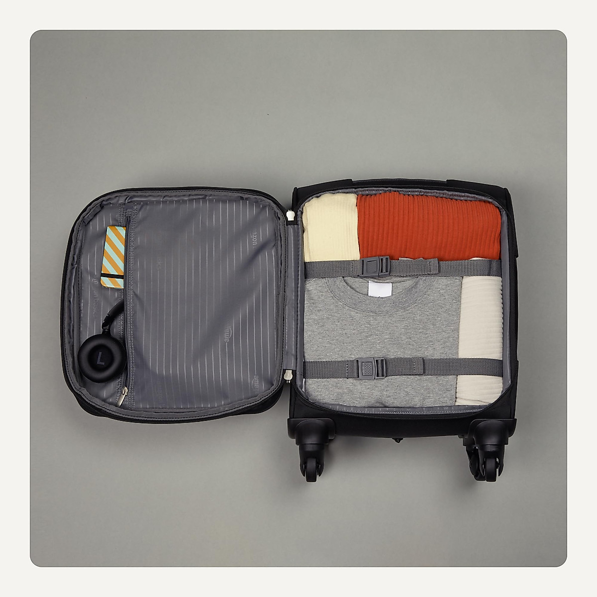 Amazon Basics Luggage, 18" Small Carry-On Softside Suitcase With Wheels, With Four 360-Degree Multi-directional Spinner Wheels, Expandable Space, Zippered Pocket and Straps, Telescopic Handle, Black