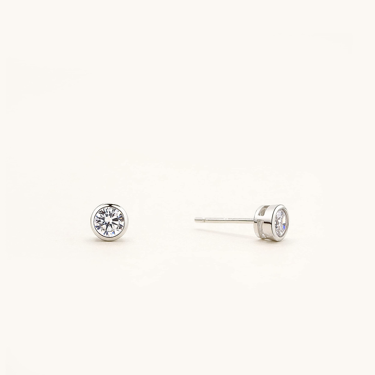 Lavishe Rhodium Plated 925 Sterling Silver Cubic Zirconia Round Bezel Set Stud Earrings, 4mm Stone