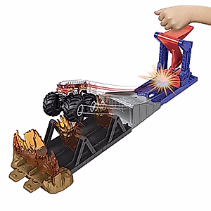 Hot Wheels Monster Trucks Fire Through Playset with 1:64 Scale Die-Cast 5-Alarm Toy Truck, Launcher & Spinning Flames