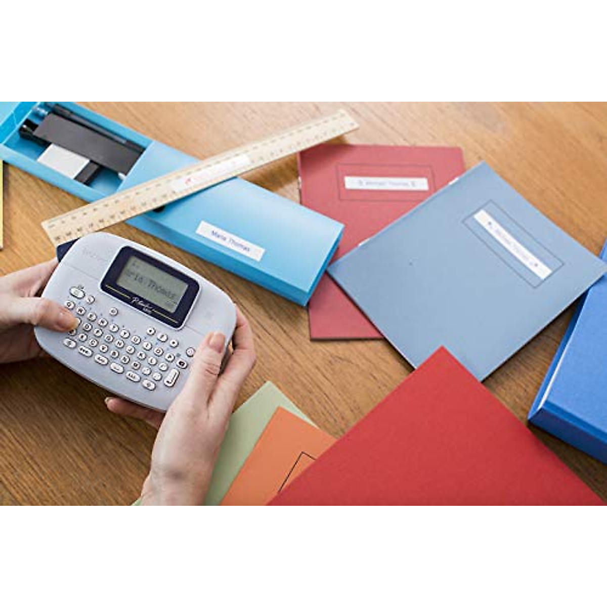 Brother PT-M95 Label Maker, P-Touch Label Printer, Handheld, QWERTY Keyboard, Up to 12mm Labels, Includes 12mm Black on White Tape Cassette