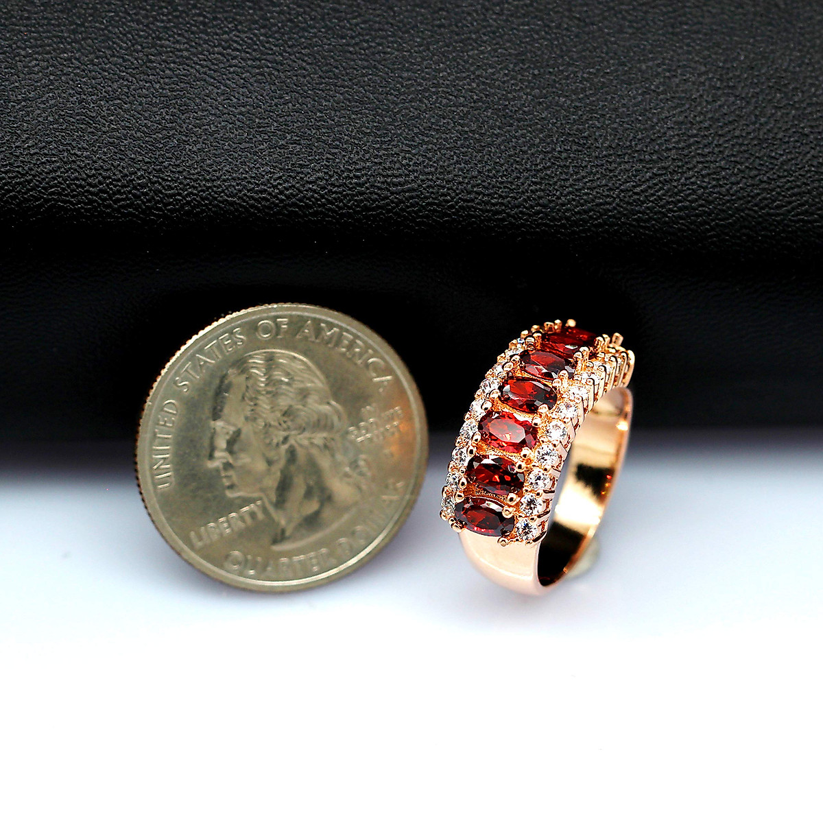 Uloveido Women's Rose Gold Plated Oval Cut Red Cubic Zirconia 7 Stone Wedding Band,Simulated Garnet Birthstone Ring J501 (Red, Size 7)