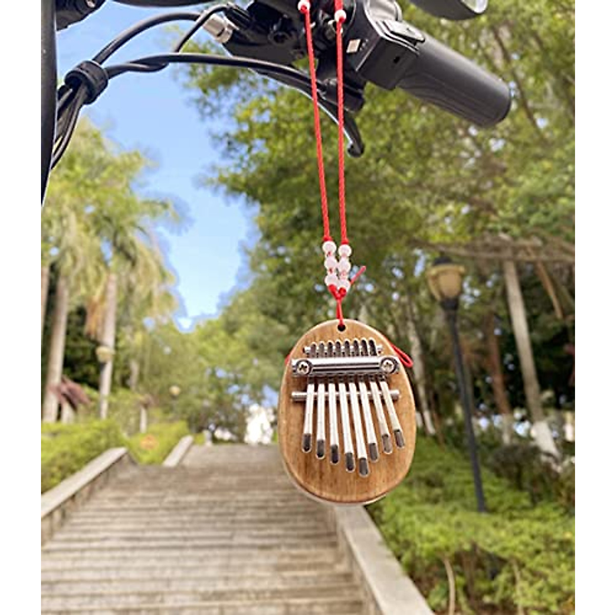SLDHR Mini 8 keys Kalimba thumb piano, portable marimba music thumb piano pendant with lanyard, a unique gift for children, adults and beginners (Oval) (B11-1)
