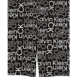 Calvin Klein Girls' Performance Bike Shorts, Soft & Stretchy with Flat Waistband & Snug Fit, Black Logo Toss, 12-14