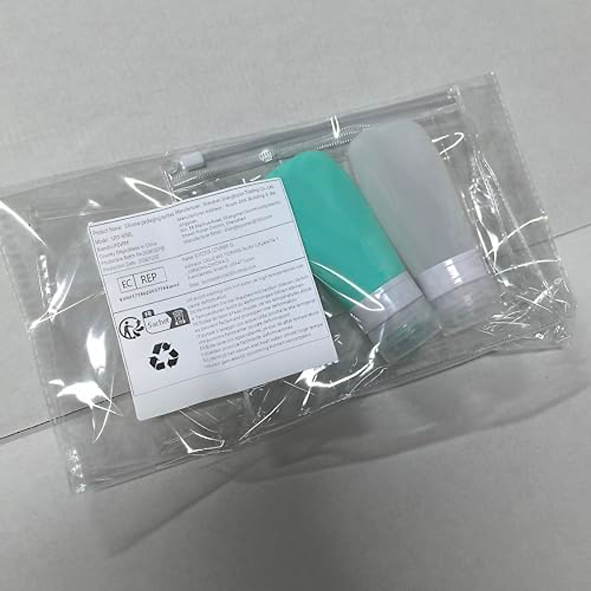 2 Pcs Silicone Travel Bottles,2oz Leak Proof Refillable Squeeze Containers with Transparent Carry Bag,Small Empty Travel Size Bottles for Shampoo,Conditioner,Lotion,Toiletries