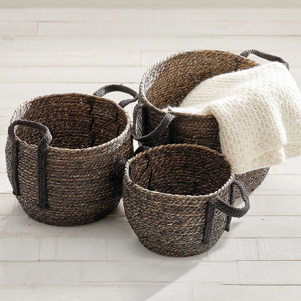 mDesign Round Braided Seagrass Woven Storage Basket with Jute Handles - Rope Weave Circle-Shaped Basket Bin for Shoe Storage in Entryway, Organizing Playroom Toys, and Laundry - Set of 3 - Black Wash