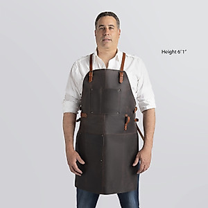 Theodore Top Grain Leather Apron - 32.5” H x 24.5” W with Adjustable Crossback Leather Straps. Our Leather Apron for Men has 2 Large Pockets and a Towel Strap. Grill Apron is Flame & Heat Resistant
