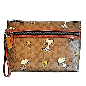 COACH Peanuts Carry All Pouch With Snoopy Woodstock Print