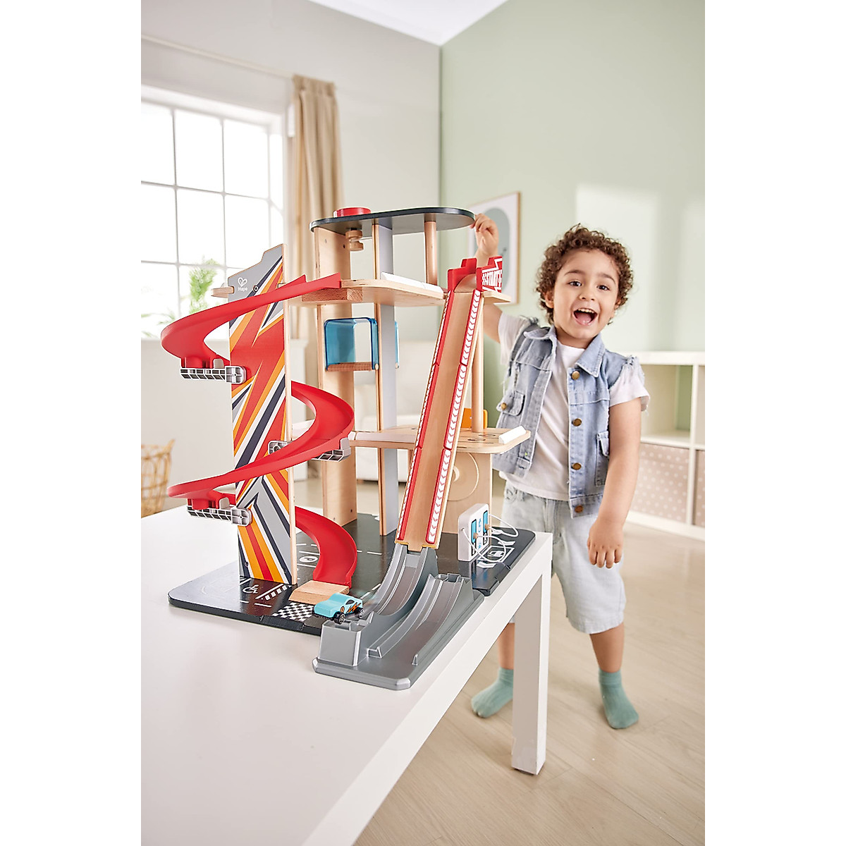 Hape Gearhead Stunt Garage Kids Wooden Toy Car Parking Garage Playset w/Elevator and 2 Exit Tracks, Detachable Loop, Includes 2 Wooden Toy Racecars