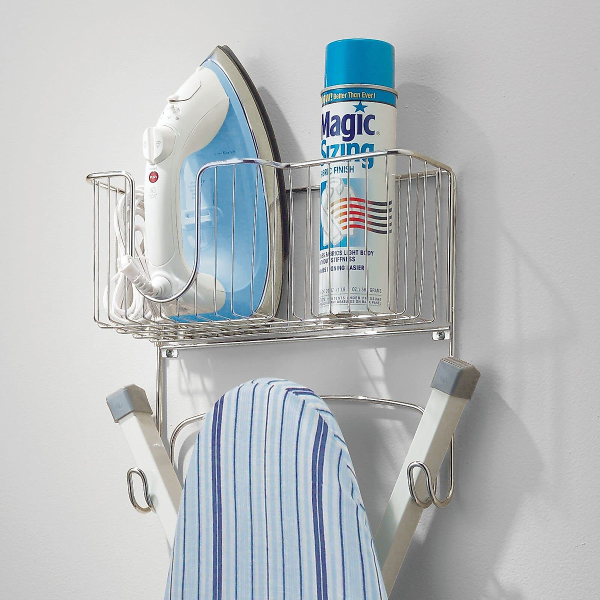 mDesign Metal Steel Ironing Board Holder Wall Mount with Large Storage Basket for Laundry Rooms - Holds Iron, Ironing Board, Spray Bottles, Starch, or Stain Sticks - Easy Installation - Chrome