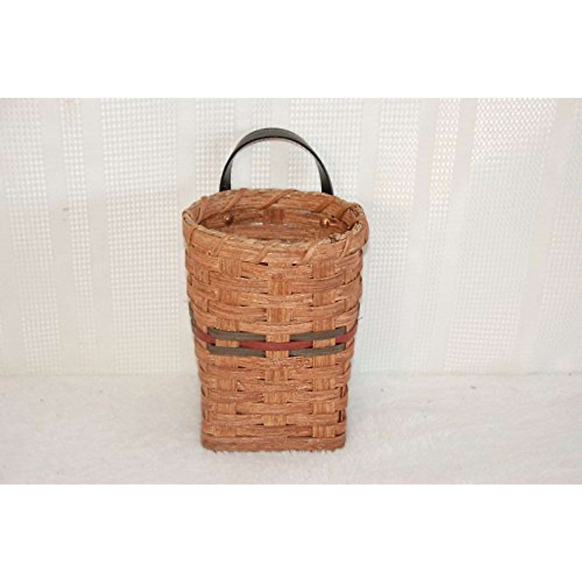 Hand Woven Utensil Wall Hanging Basket. This Cute Basket Is Handmade Locally Here in Ohio By the Local Amish. It Is a Very Handy Basket That Allows You to Store Your Utensils in a Basket on the Wall Saving Space on Your Counters. Measures: 4" X 3" X 8" Ta