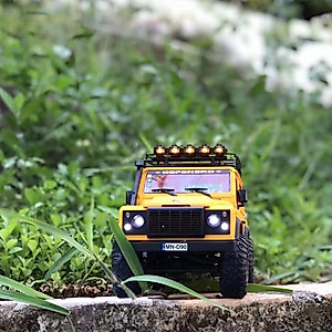 HobbyToki 1/12 RC Crawler 4WD 2.4G Rock Truck Buggy Offroad Cars Defender with Roof Light Sound Full Scale Remote Control Adult Kids Toys (Yellow)