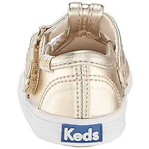 Keds Baby Champion LACE Toe Cap Tstrap Sneaker, Champagne Metallic, 3 US Unisex Infant