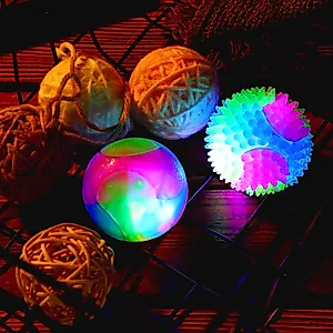 Sumind 4 Pieces Light Up Dog Balls Glowing Elastic LED Flashing Spike Pet Molar Light Color Balls Interactive Pet Toys for Cats Dogs Chewing Playing (2.2 Inch, 2 Styles)