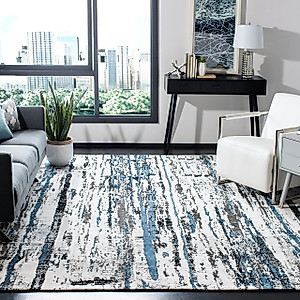 SAFAVIEH Classic Vintage Collection Area Rug - 8' x 10', Navy & Ivory, Abstract Design, Non-Shedding & Easy Care, Ideal for High Traffic Areas in Living Room, Bedroom (CLV702N)
