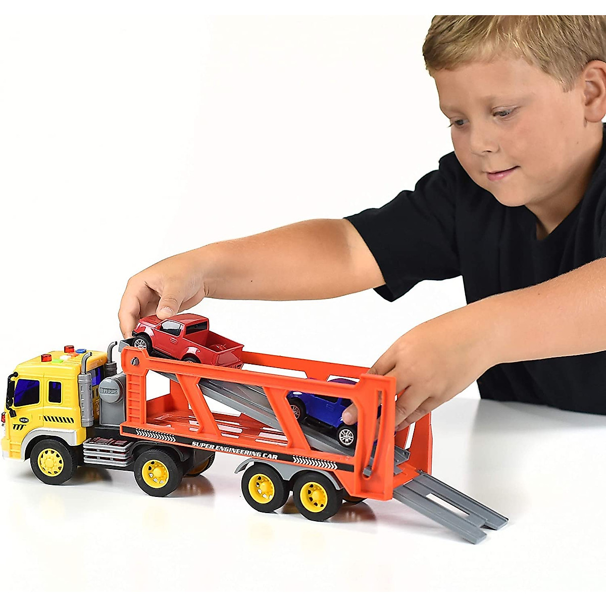 Sunny Days Entertainment Maxx Action 17’’ Vehicle Transport with 4 Diecast Trucks – Bright Lights and Car Sounds | Friction Powered Trailer | 6 Piece Toy Playset for Kids