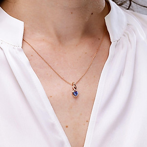 Angara Women’s 0.4 Cttw Sterling Silver Natural Tanzanite Infinity Pendant Necklace with diamond.