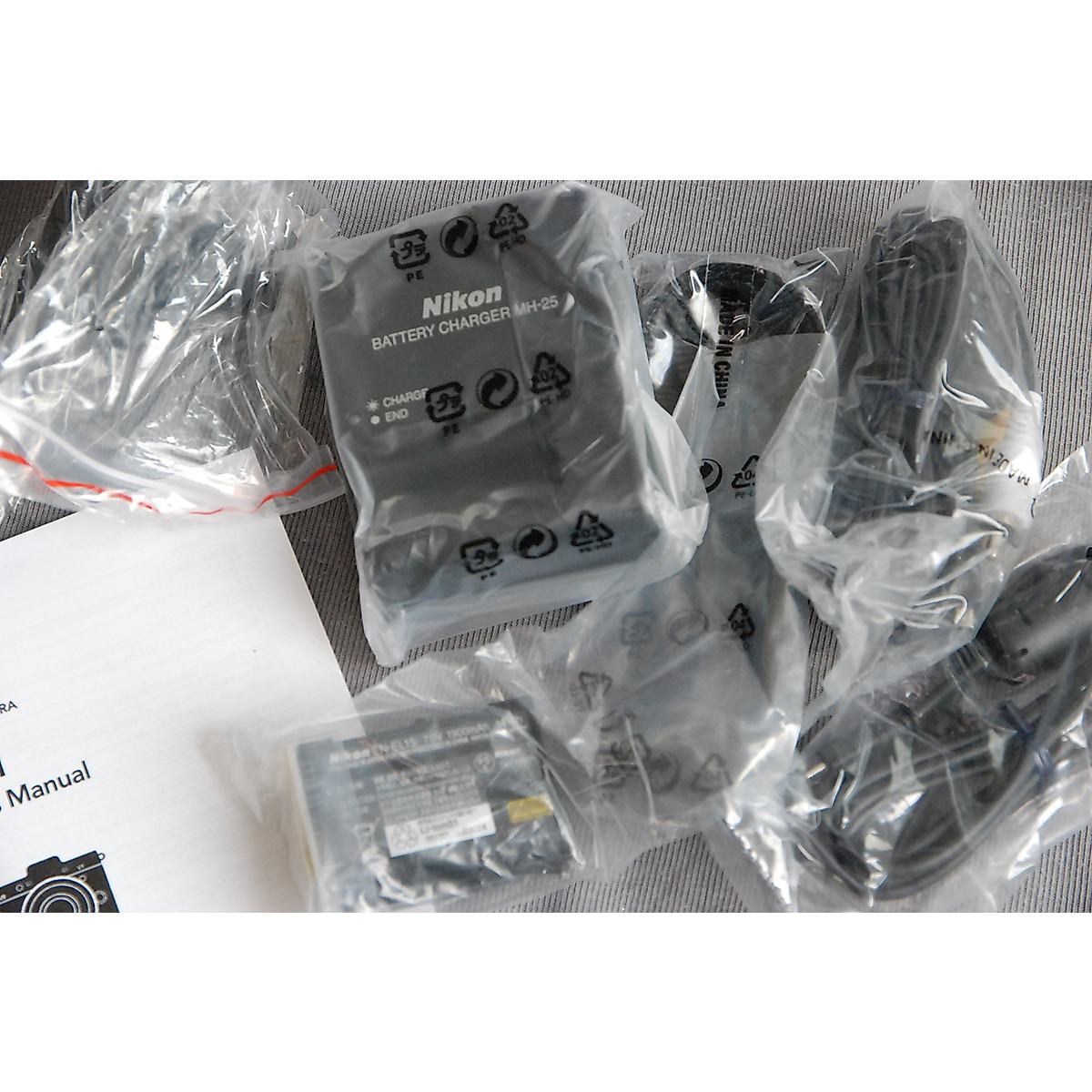 Nikon 1 V1 Mirrorless Digital Camera with 10-30mm Lenses (Black)