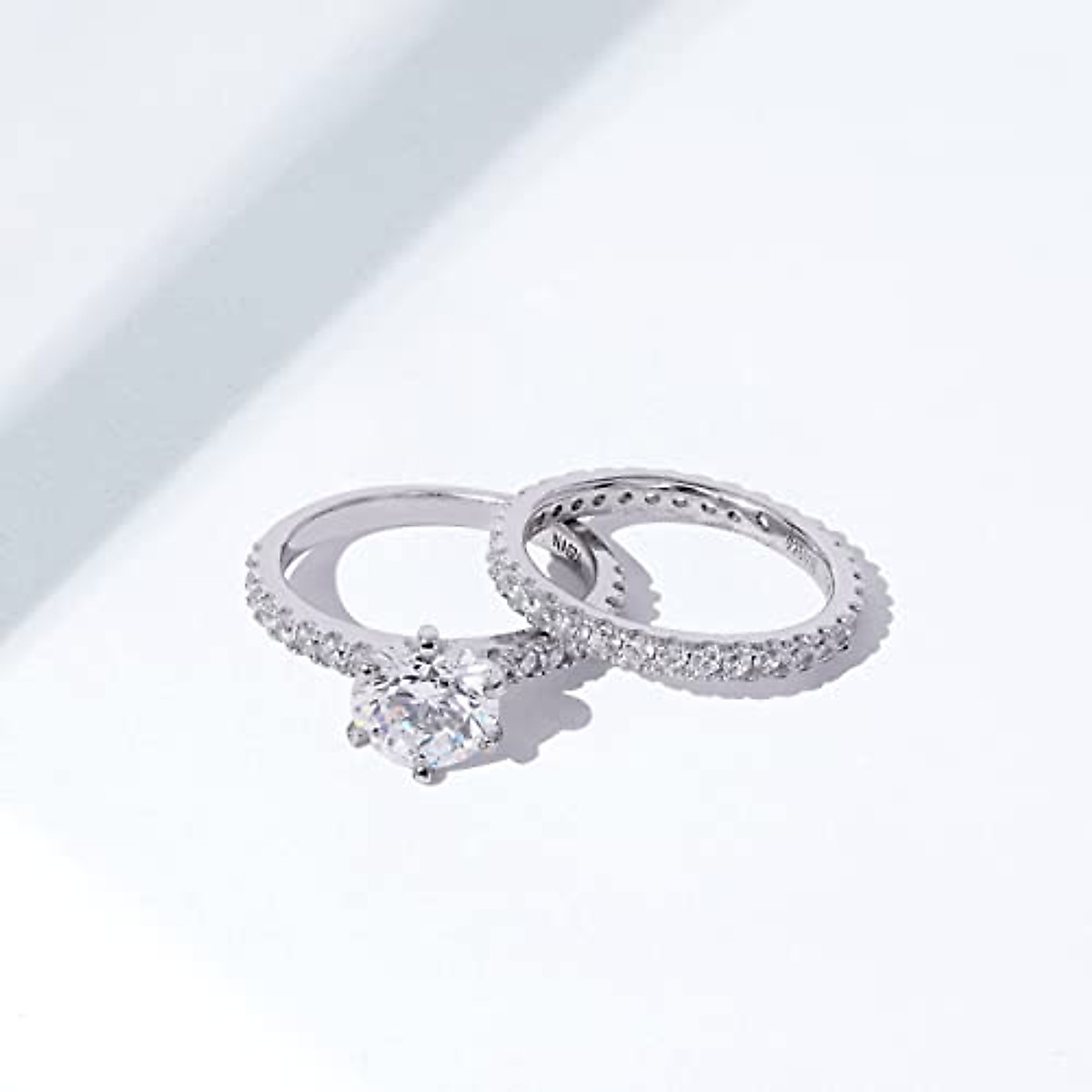 Amazon Essentials Platinum-Plated Sterling Silver Round Ring Set made with Infinite Elements Cubic Zirconia (1 Carat Center Stone), Size 7 (previously Amazon Collection)