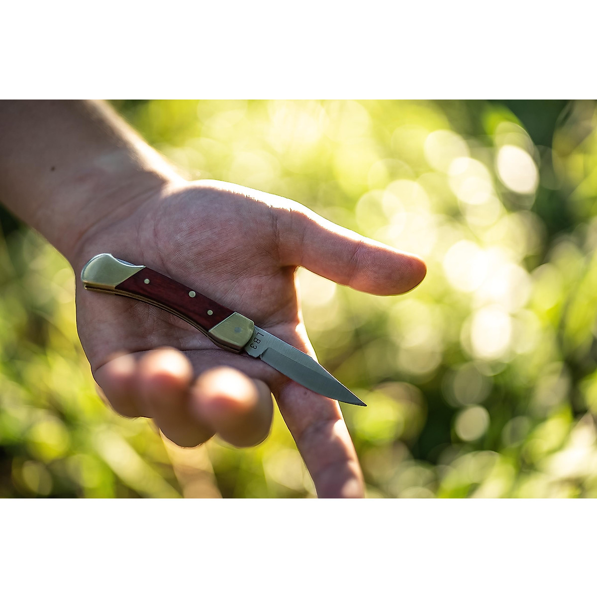 Uncle Henry LB3 Brown Bear 5.1in High Carbon S.S. Folding Knife with a 2.2in Clip Point Blade and Wood Handle for Outdoor Survival, Camping and Hunting