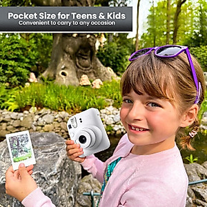 Fujifilm Instant Mini 12 Instant Camera Lilac Purple + MiniMate Accessory Bundle & Compatible Custom Case + Fuji Instant Film Value Pack (50 Sheets) Designer Photo Album (Lilac Purple)