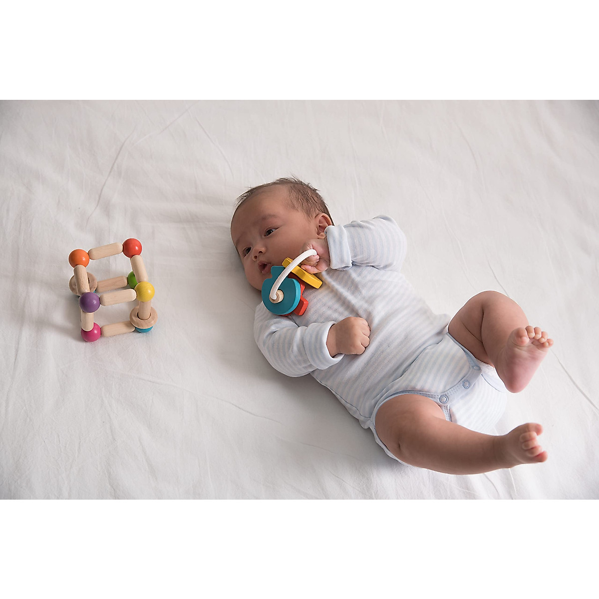 PlanToys Wooden Clutching Triangle Baby Toy with Gentle Sound in Two-Toned Ball (5244) | Sustainably Made from Rubberwood and Non-Toxic Paints and Dyes