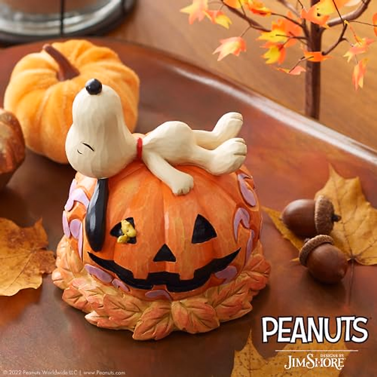 Enesco Peanuts by Jim Shore Halloween Snoopy Laying on Carved Pumpkin Figurine, 5.5 Inch, Multicolor
